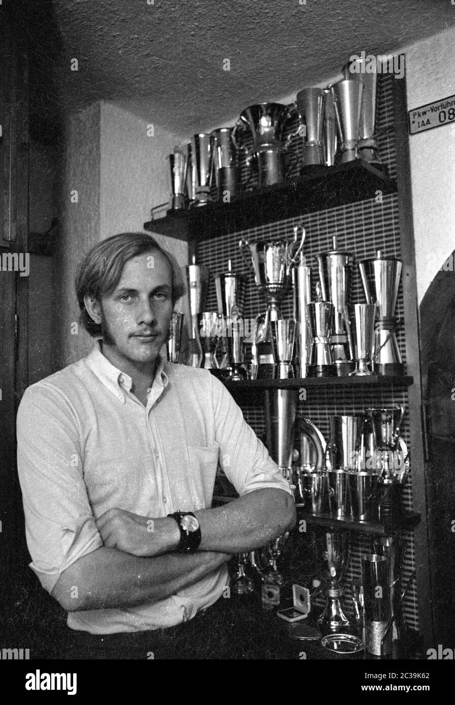 The racing driver Hans-Joachim Stuck poses for a photo in front of his ...