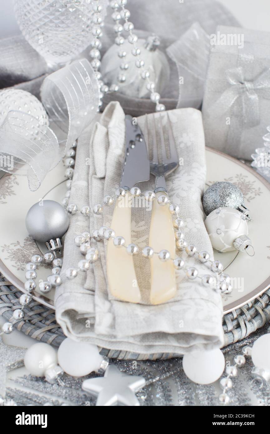 Silver Christmas Table Setting with christmas decorations Stock Photo ...