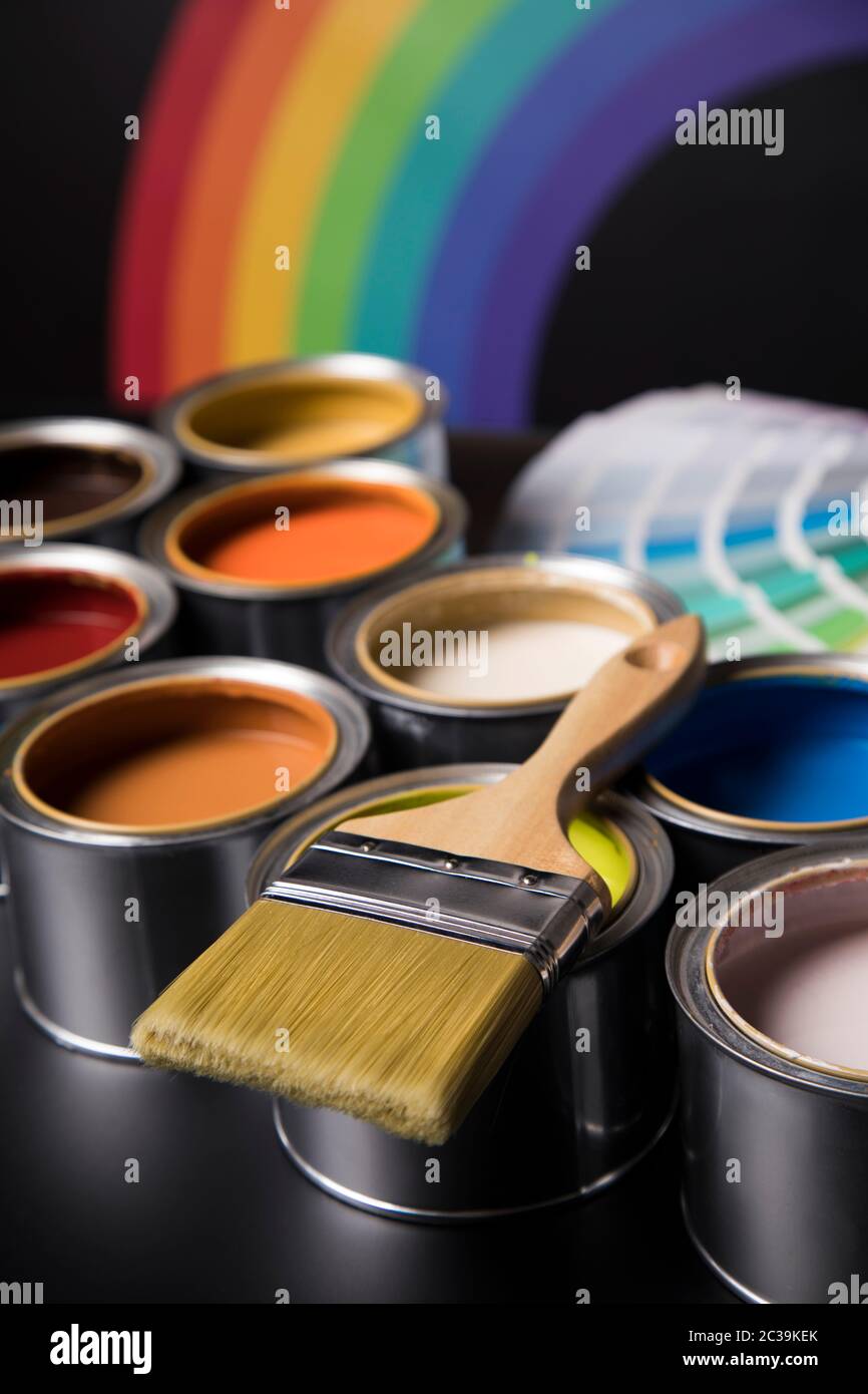 Paint can and paintbrush, Rainbow colors Stock Photo - Alamy
