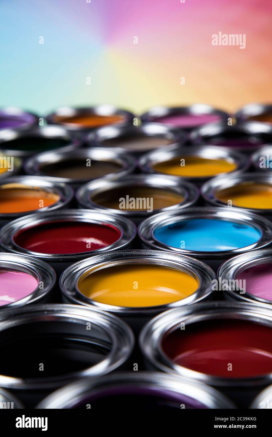 Rainbow colors, Open cans of paint Stock Photo - Alamy