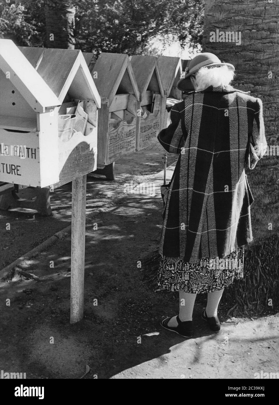 Containing religious Black and White Stock Photos & Images - Alamy