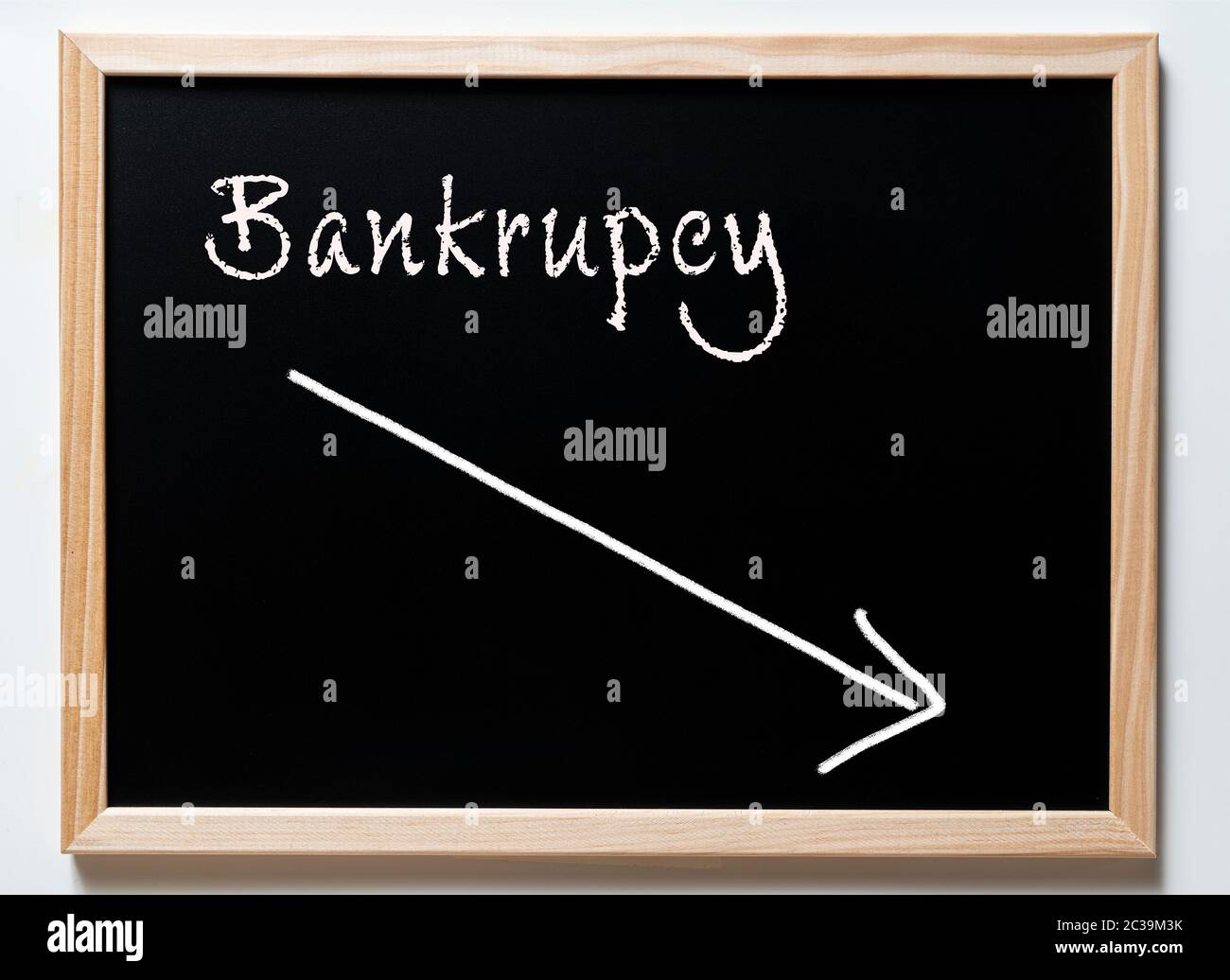 a blackboard with written the word Bankrupty Stock Photo - Alamy