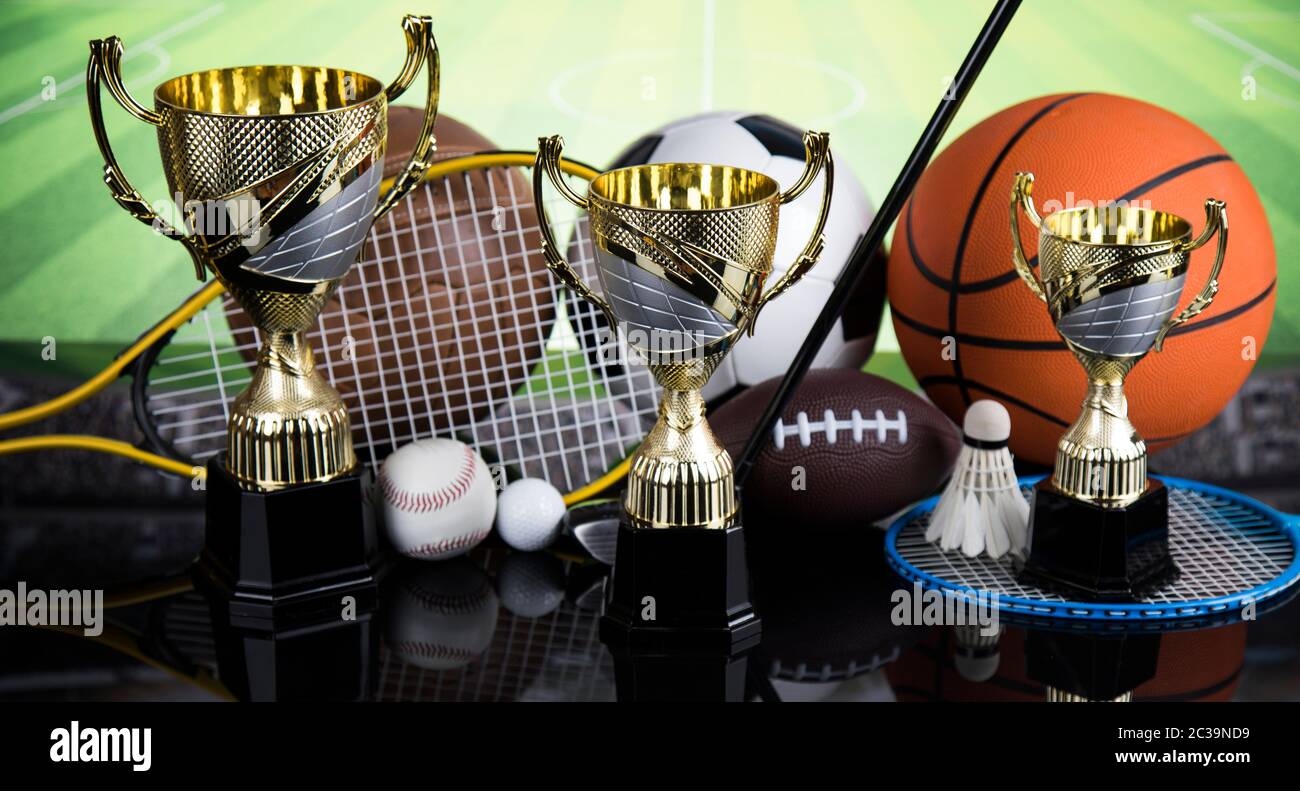 Trophy cup and sport ball background Stock Photo - Alamy