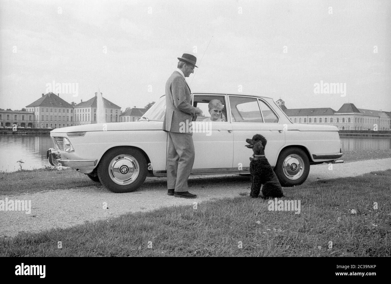 BMW 2000 TI 1966 against the background of Nymphenburg Palace in Munich ...