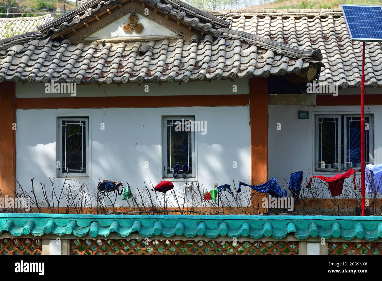 North Korea, Pyongyang - May 5, 2019: Typical house of peasants built ...