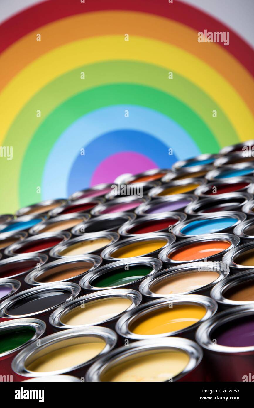 Group of tin metal cans with color paint Stock Photo - Alamy