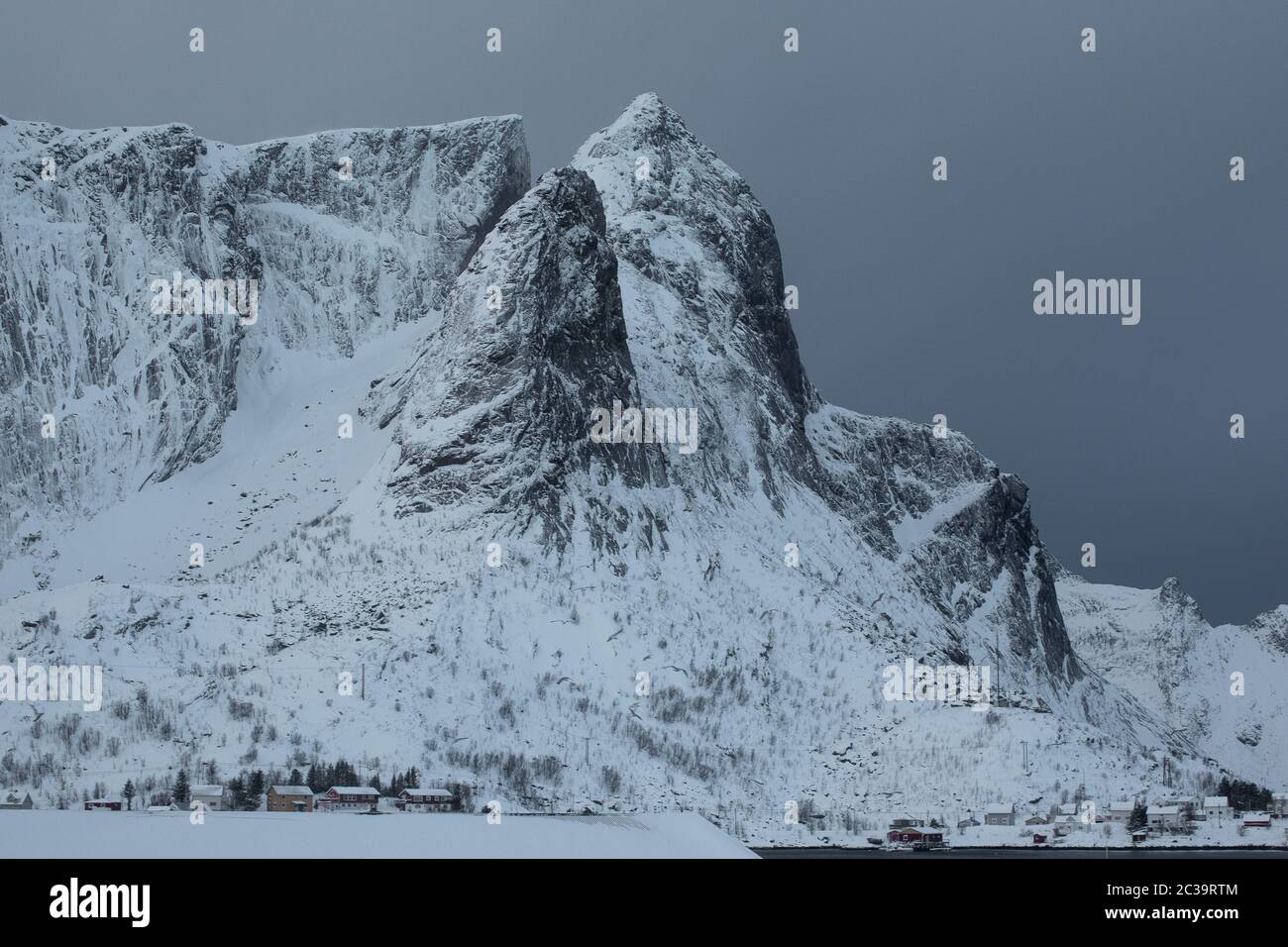 The snowy mountain ridge in the arctic village of Reine Stock Photo - Alamy