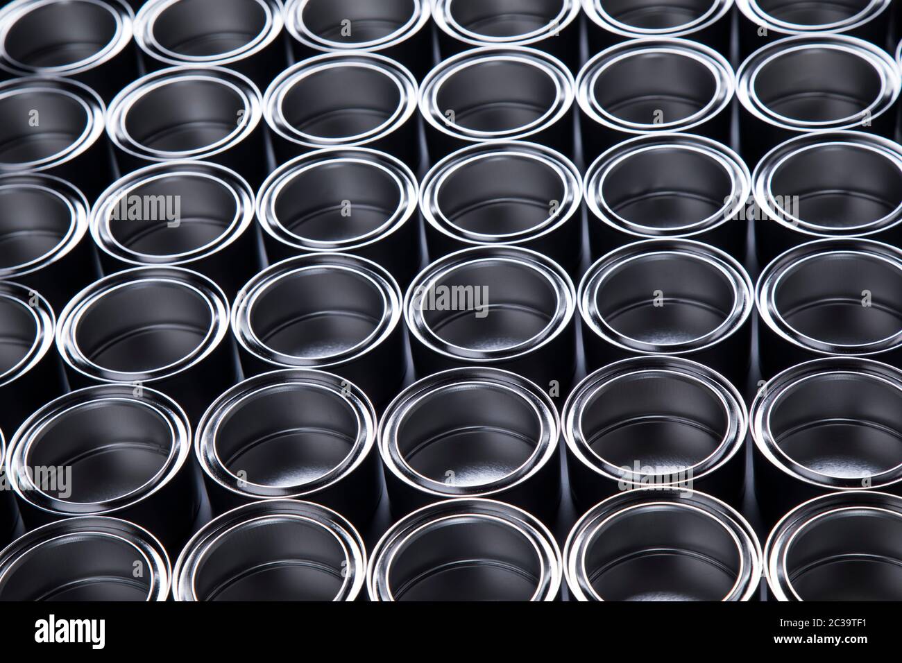 Group of tin metal cans with color paint Stock Photo - Alamy