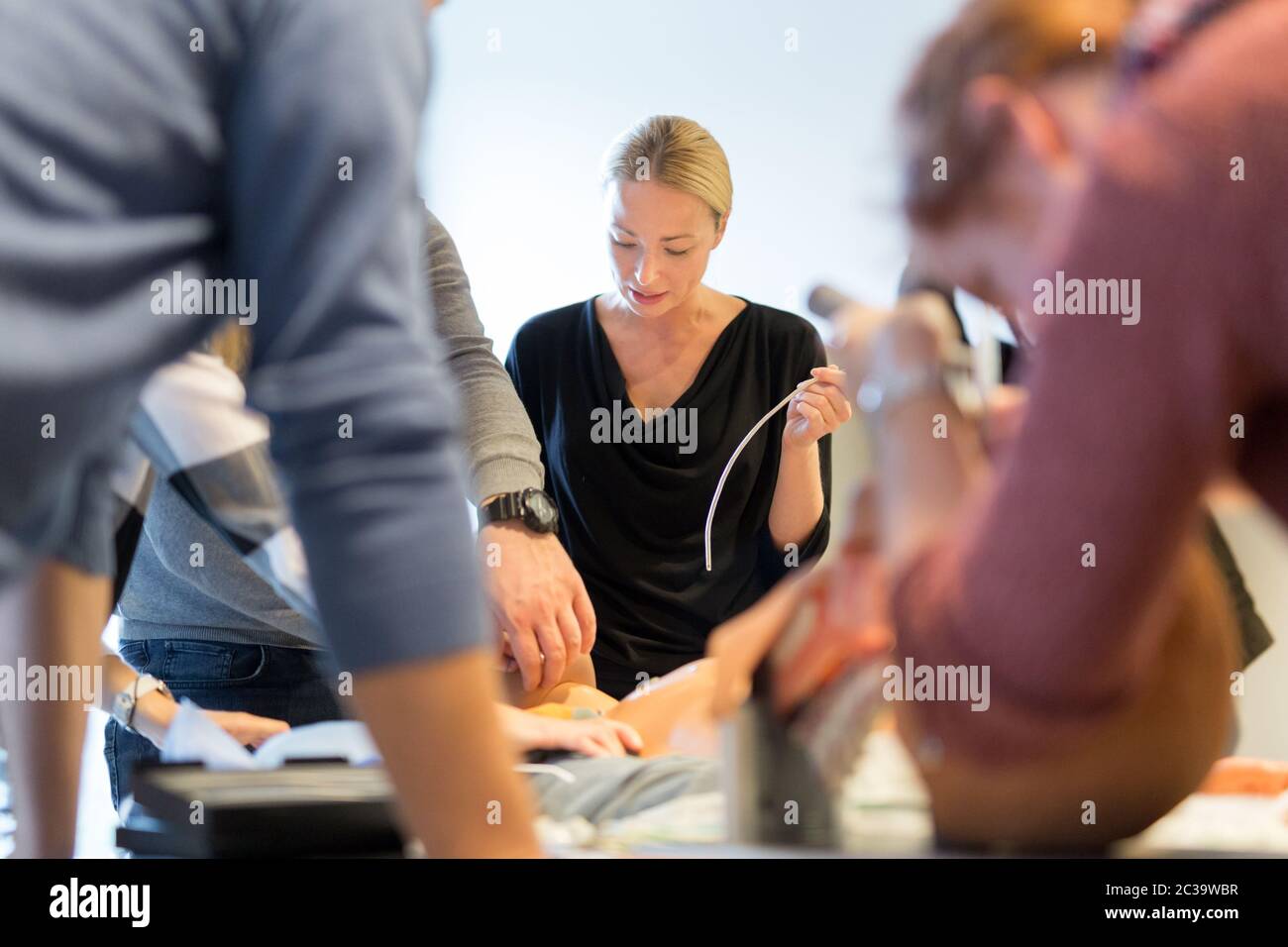 Medical doctor expert instructor displaying method of patient ...