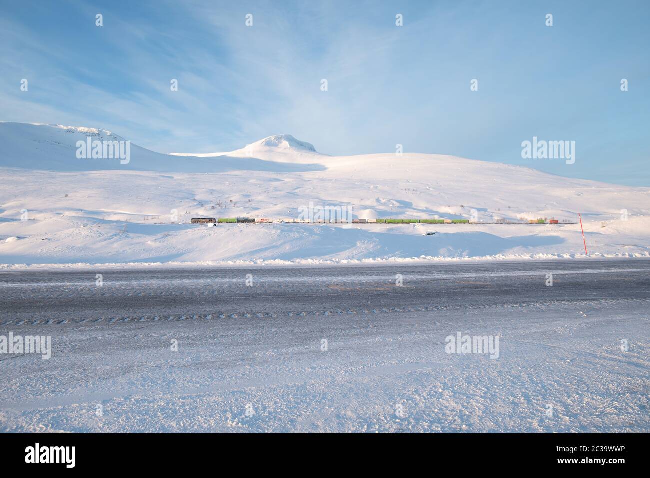 A arctic freight train passes through the north of Norway Stock Photo ...