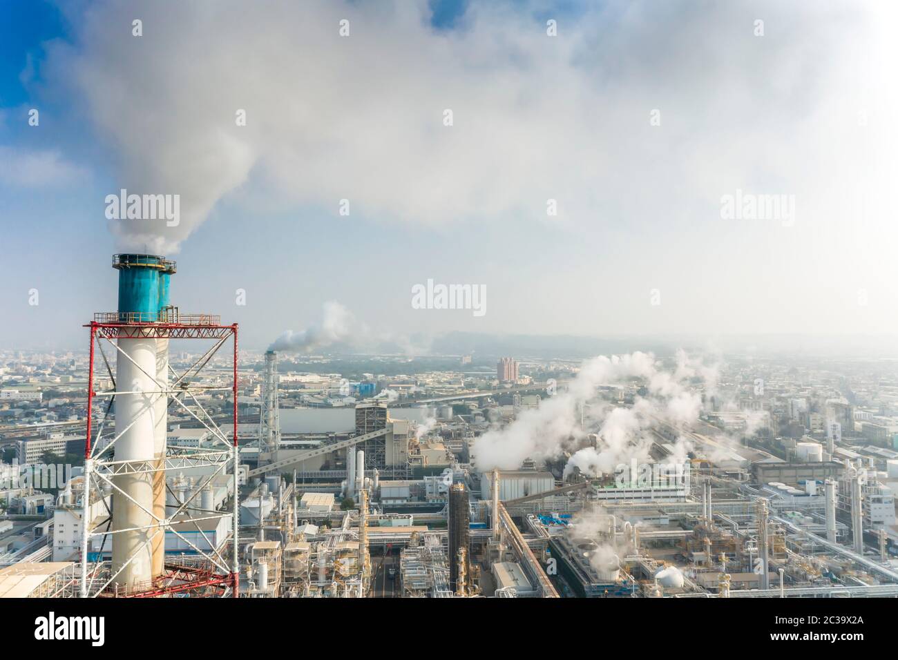 Aerial view of industrial area with chemical plant. Smoking chimney ...