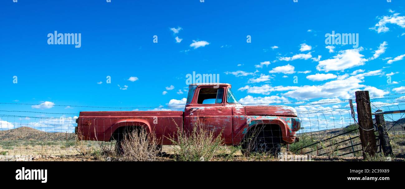 Old rusty red car abandoned Stock Photo - Alamy