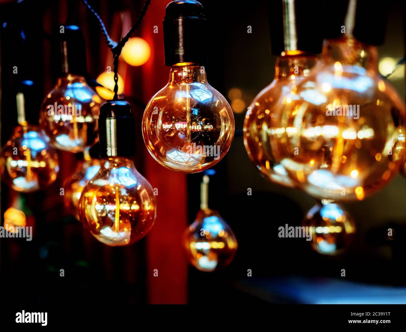 Hanging Light Bulb Black Background