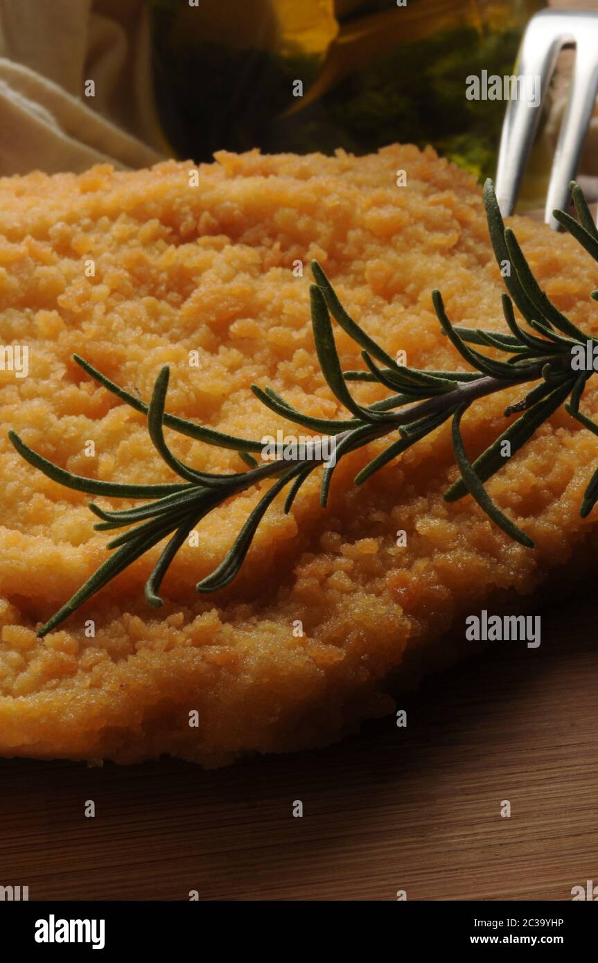Chicken cotoletta with scamorza cheese Stock Photo - Alamy