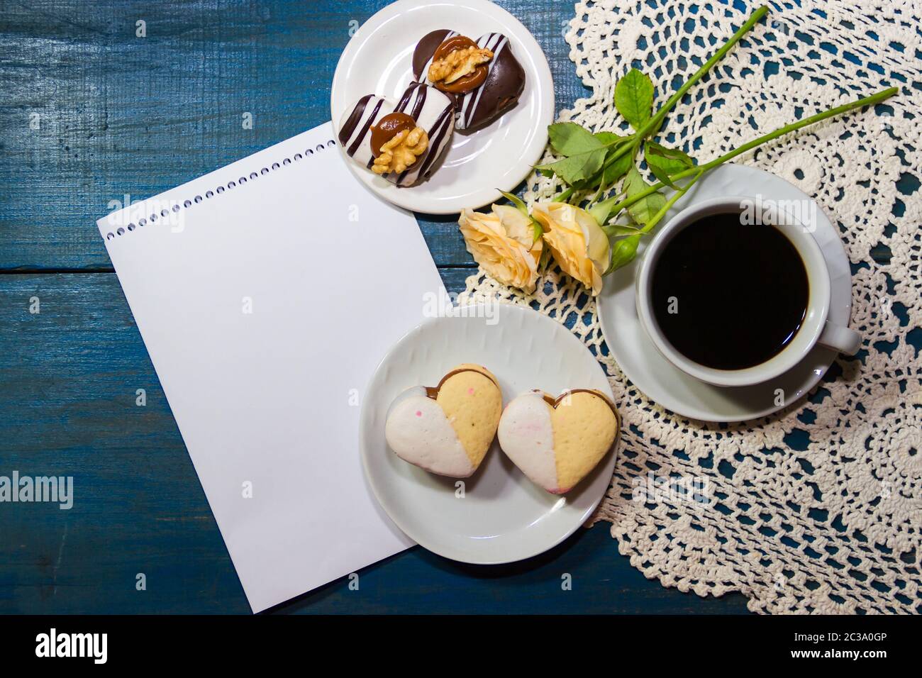 romantic coffee background with sweet cookies and roses with ...