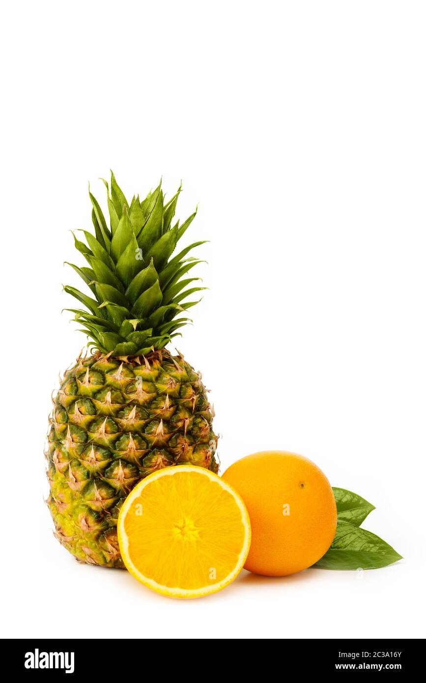 Pineapple and orange isolated on white background Stock Photo - Alamy