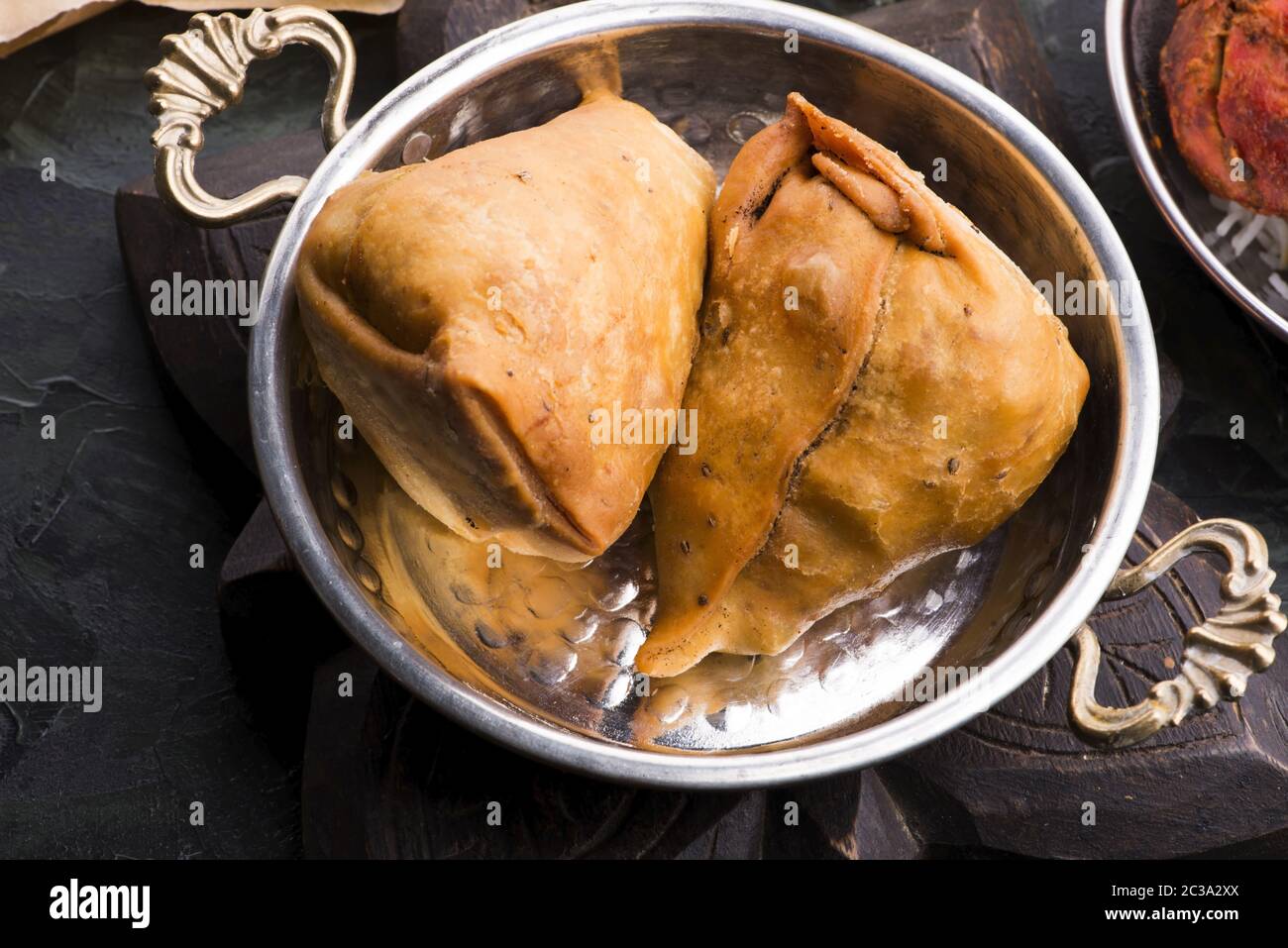Veg Samosa - is a crispy and spicy Indian triangle shape snack Stock ...
