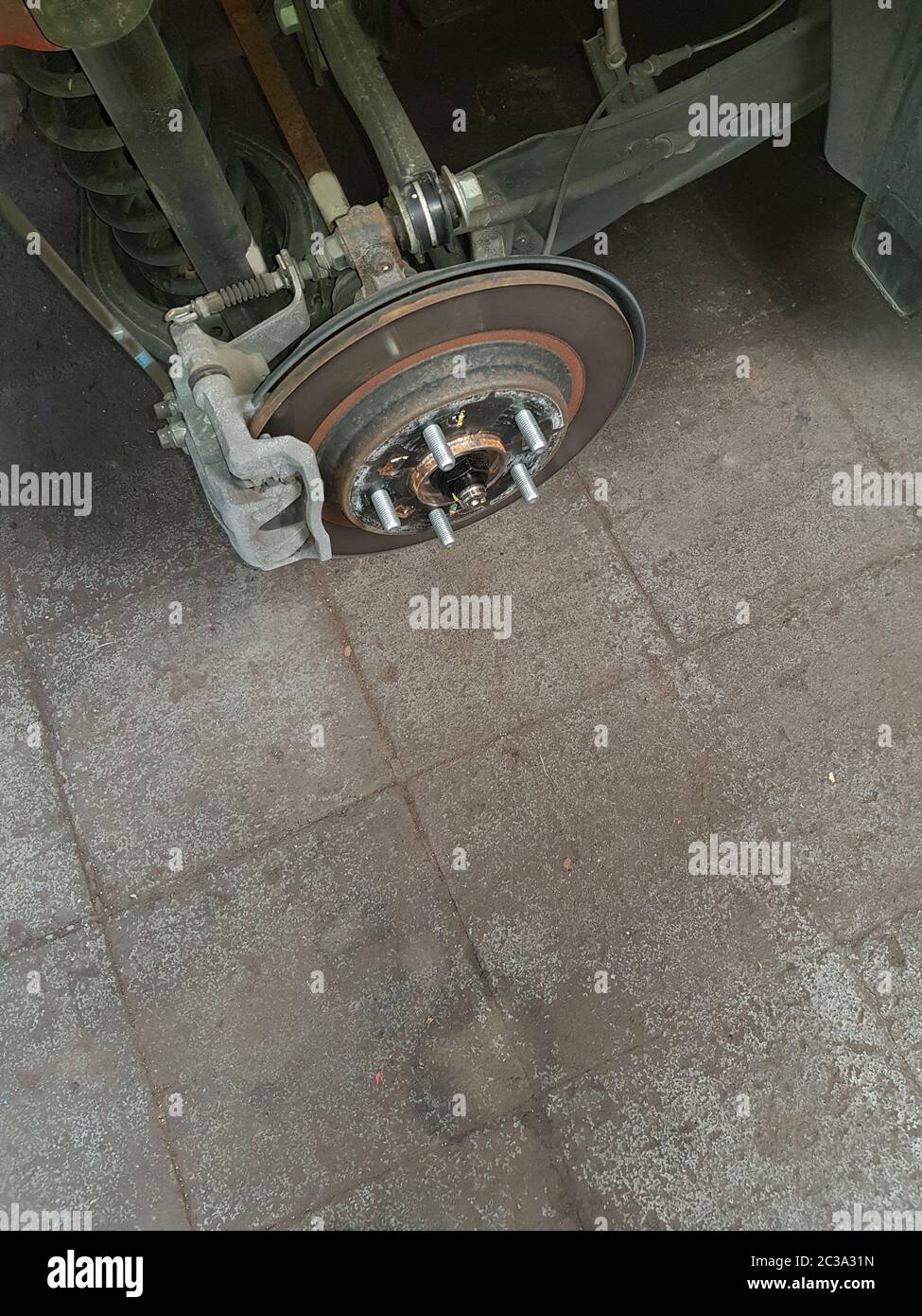 Brake disk and detail of a wheel hub Stock Photo - Alamy