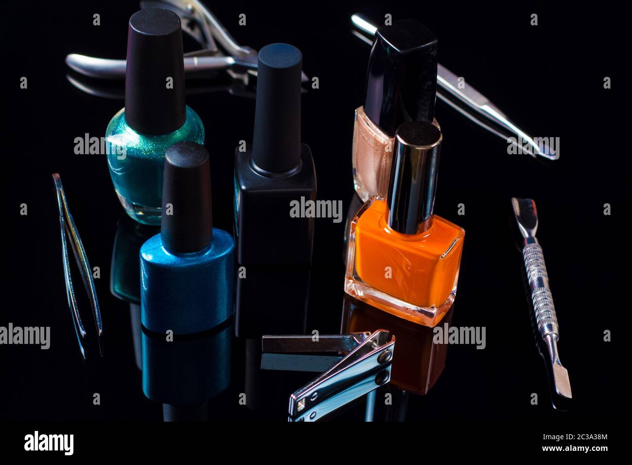 Manicure and pedicure tools on black background, isolated. Equipment ...