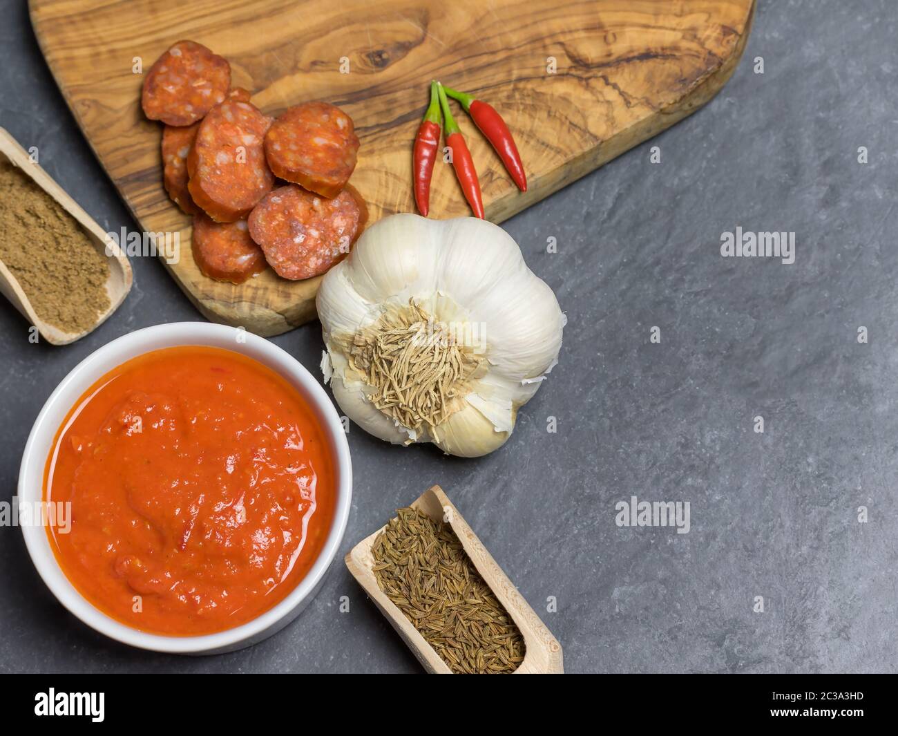 Top view of the Harissa sauce, coriander, roman cumin, garlic and ...
