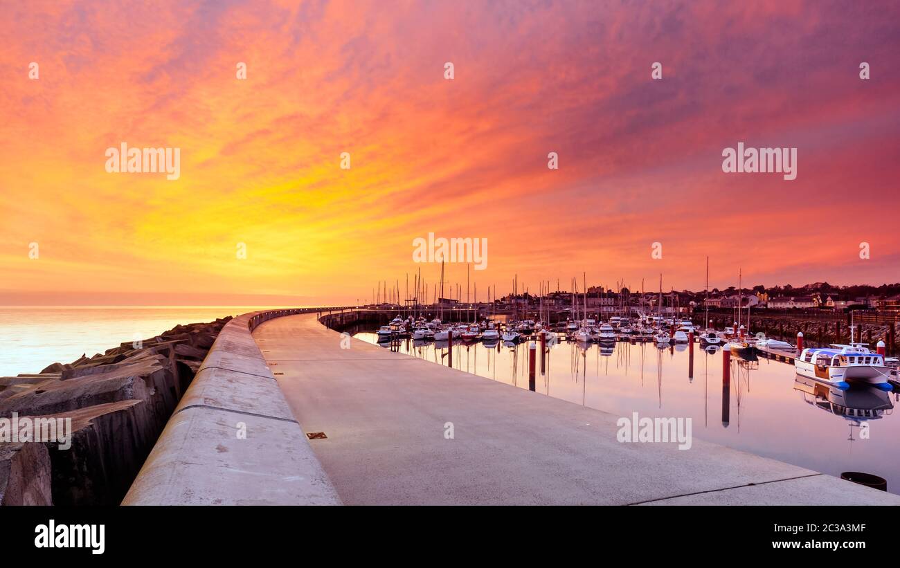 Amazing sky on sunrise at Greystones yacht marina or harbour with ...