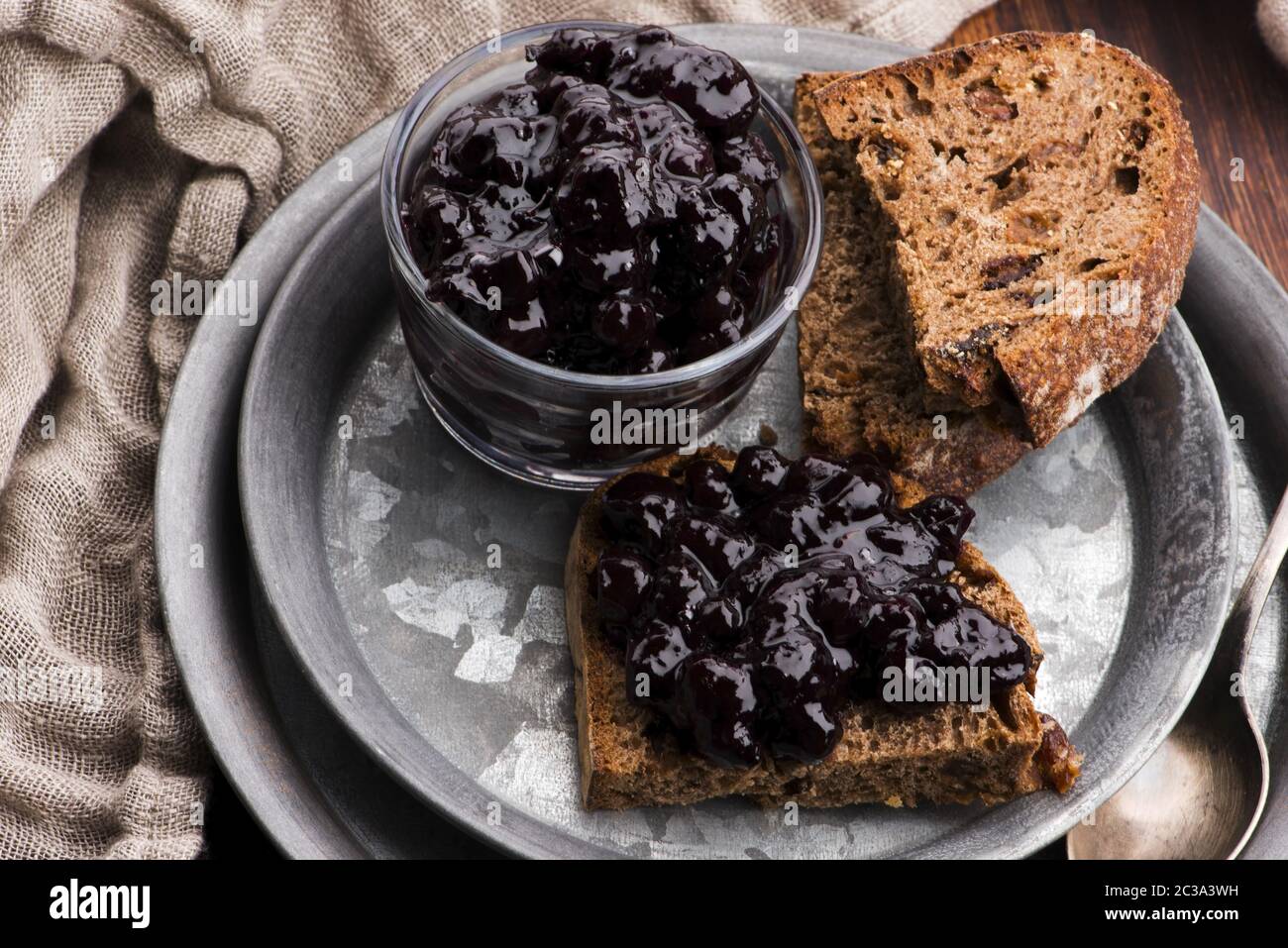Bread with blueberry jam on the plate Stock Photo - Alamy
