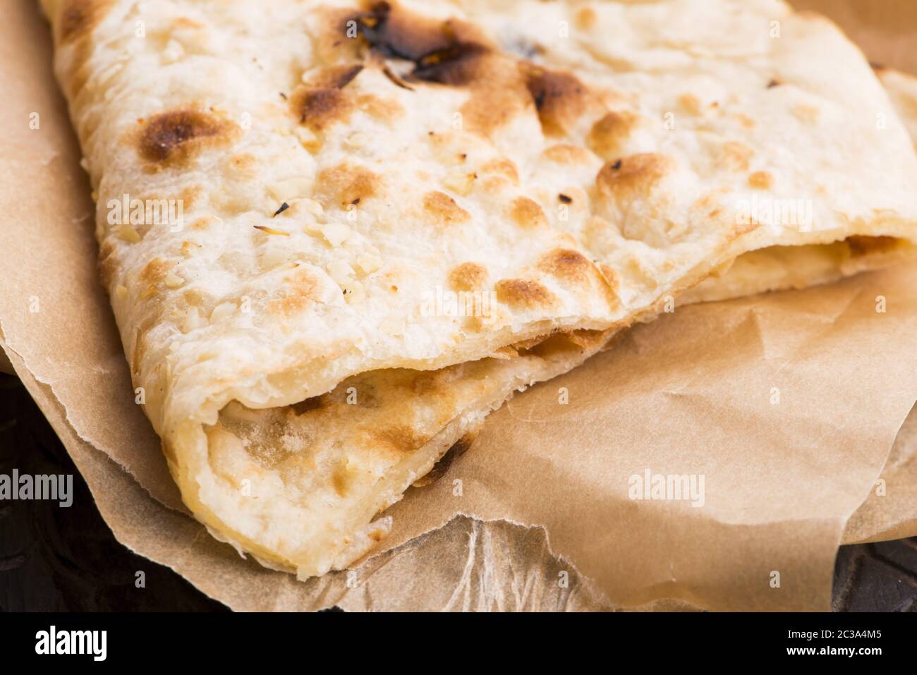 Garlic Naan, Indian flat bread Stock Photo - Alamy