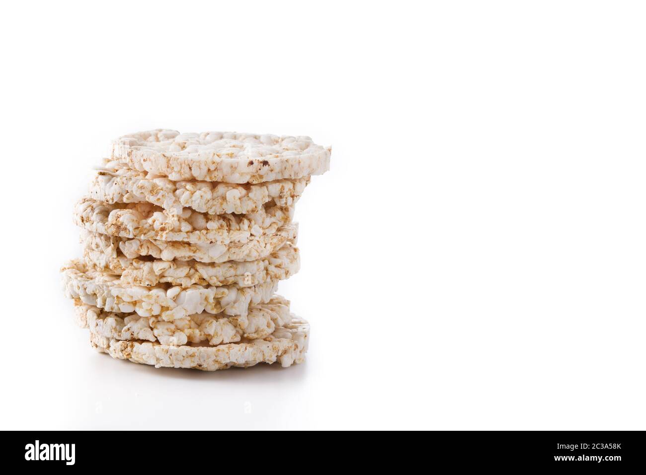 Pile of puffed rice cakes isolated on white background Stock Photo - Alamy