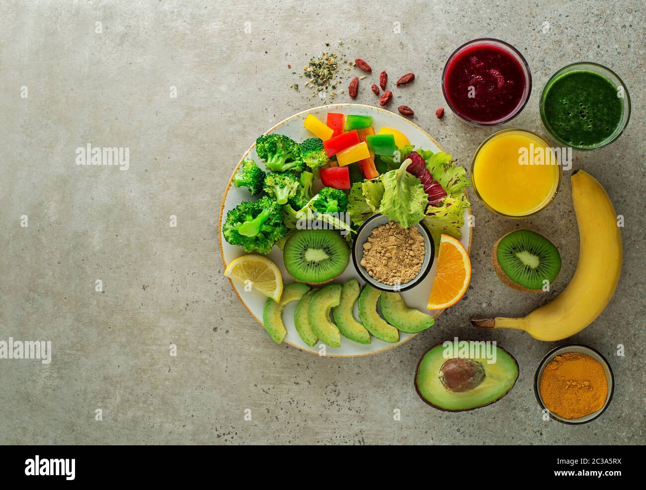 Healthy fresh fruit and vegetable smoothies with assorted ingredients ...