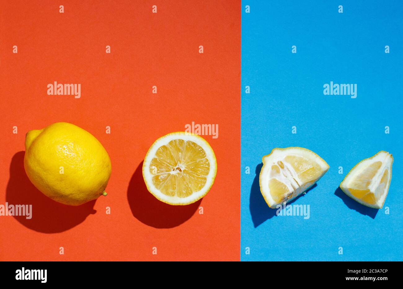 Lemons on a red and blue backgroundtop view Stock Photo - Alamy