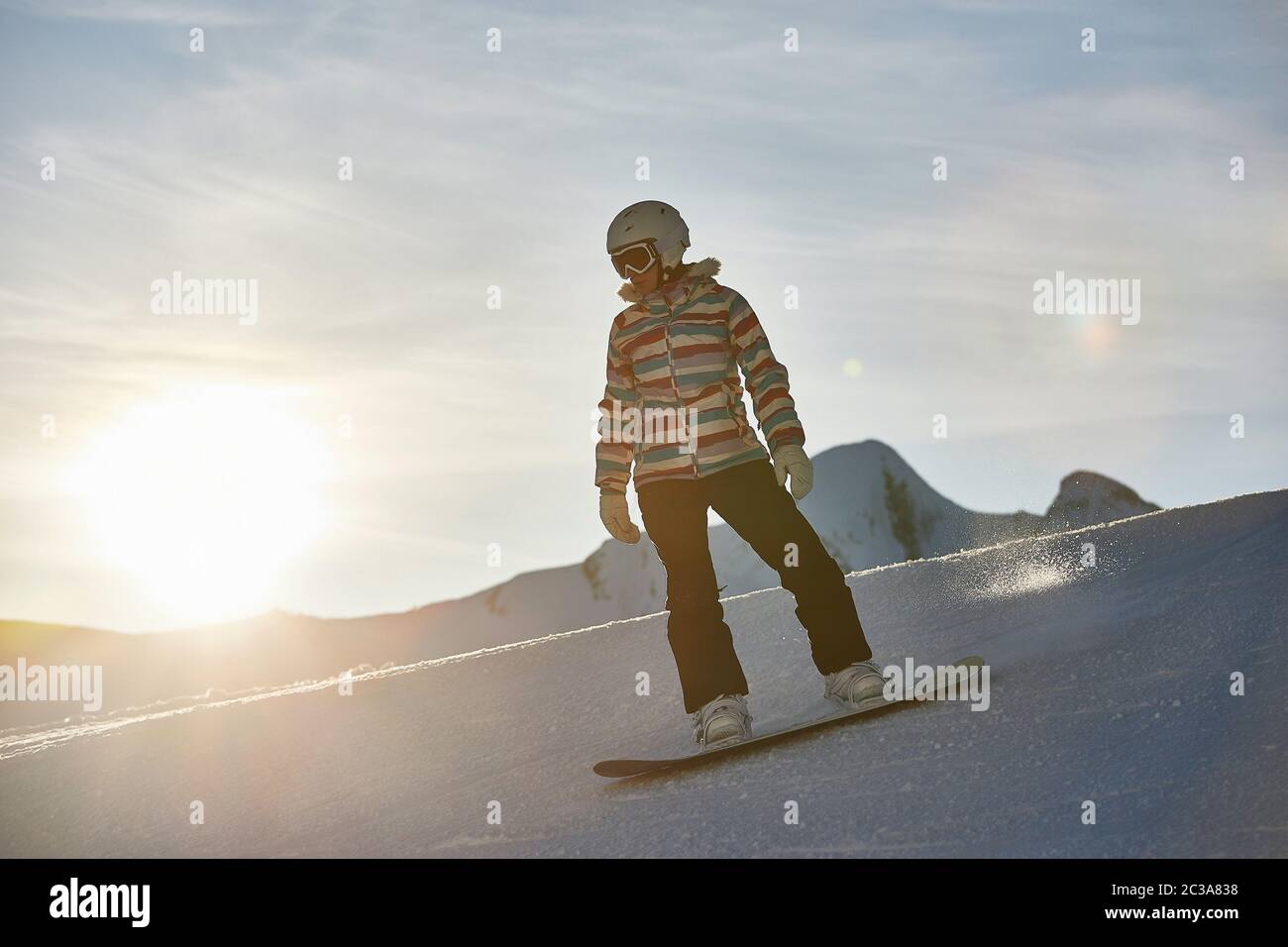 Snowboarding in the alps, sunlight flares on wet camera lens Stock ...
