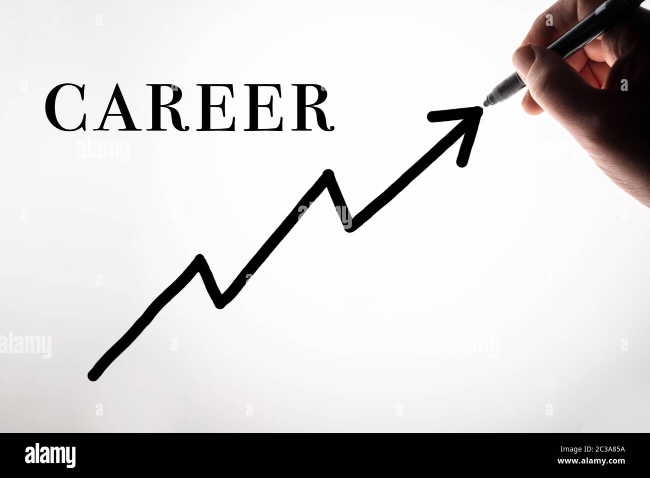 the career graph drawn on a backlit surface Stock Photo - Alamy