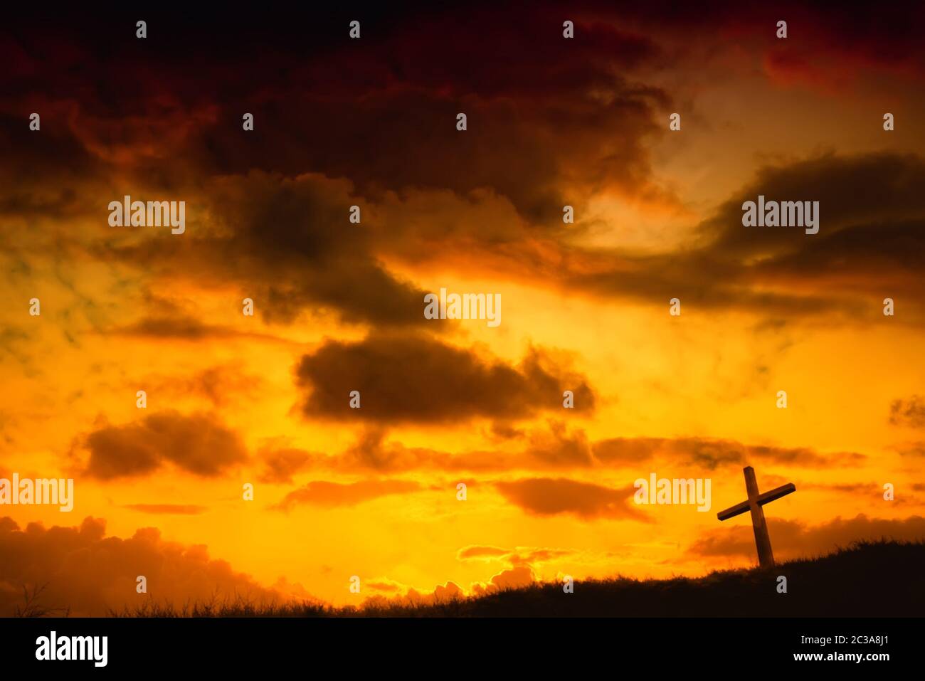 cross silhouette and the clouds at sunset Stock Photo - Alamy