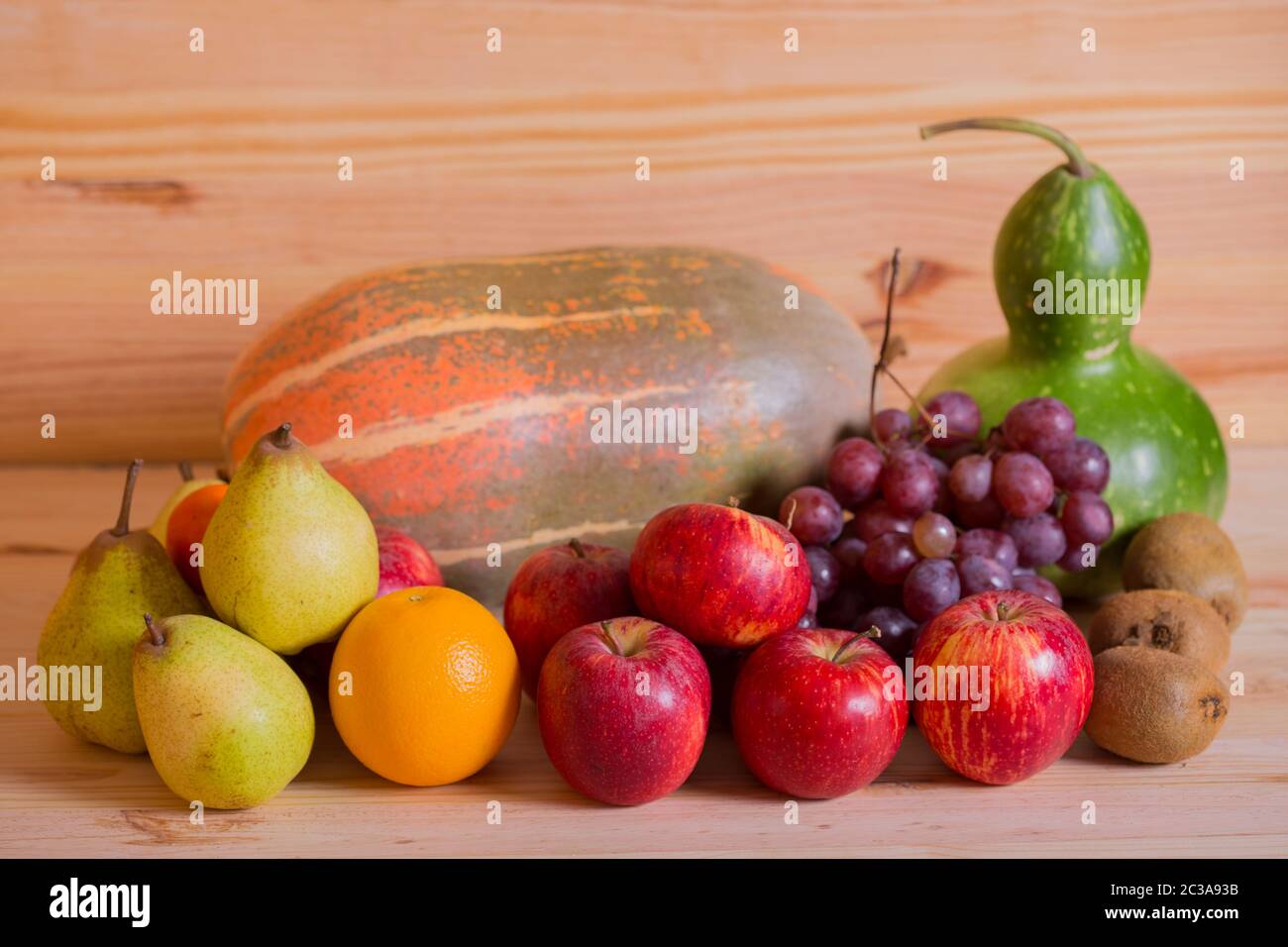 fruits on wooden table, studio picture Stock Photo - Alamy