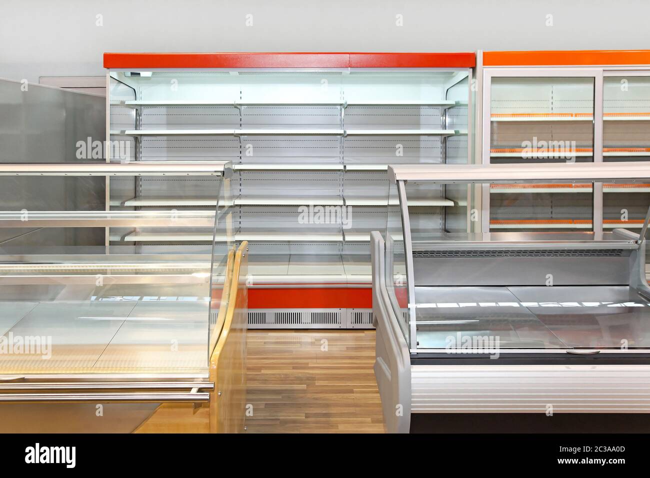 Empty retail shelves and showcases in grocery store Stock Photo - Alamy