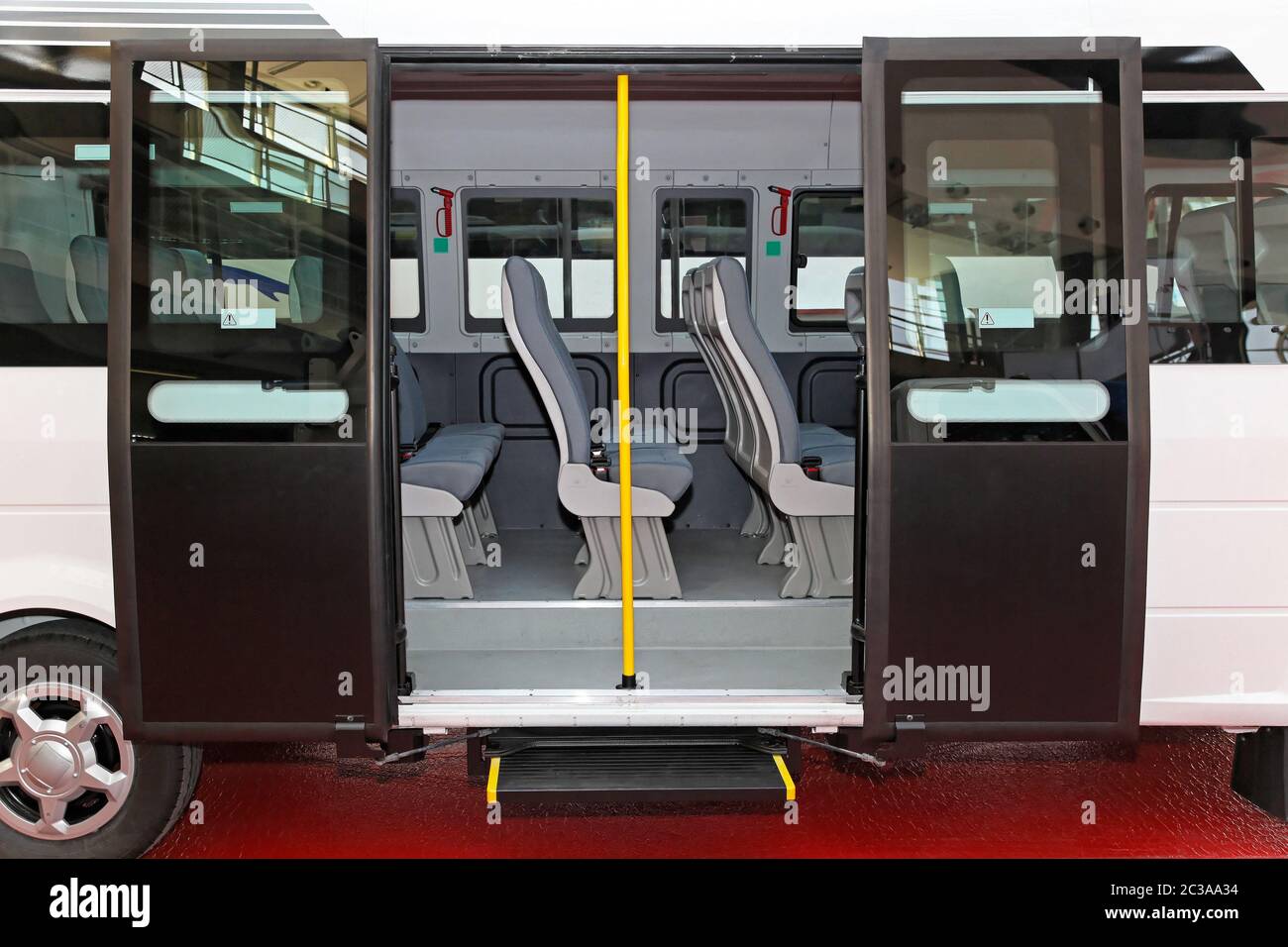 Regional mini bus with open double doors Stock Photo - Alamy