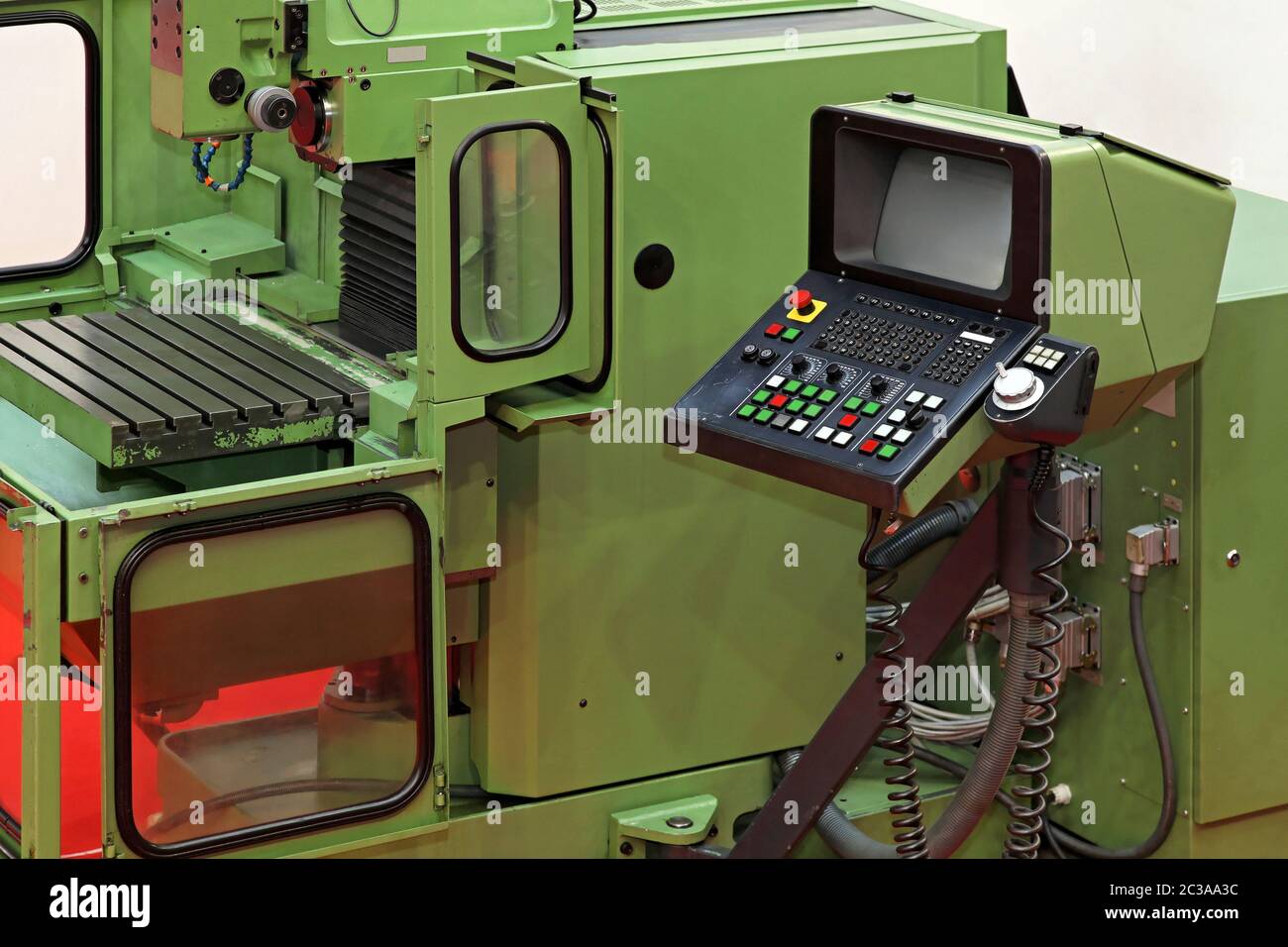 Automated lathe machine system in metal factory Stock Photo - Alamy