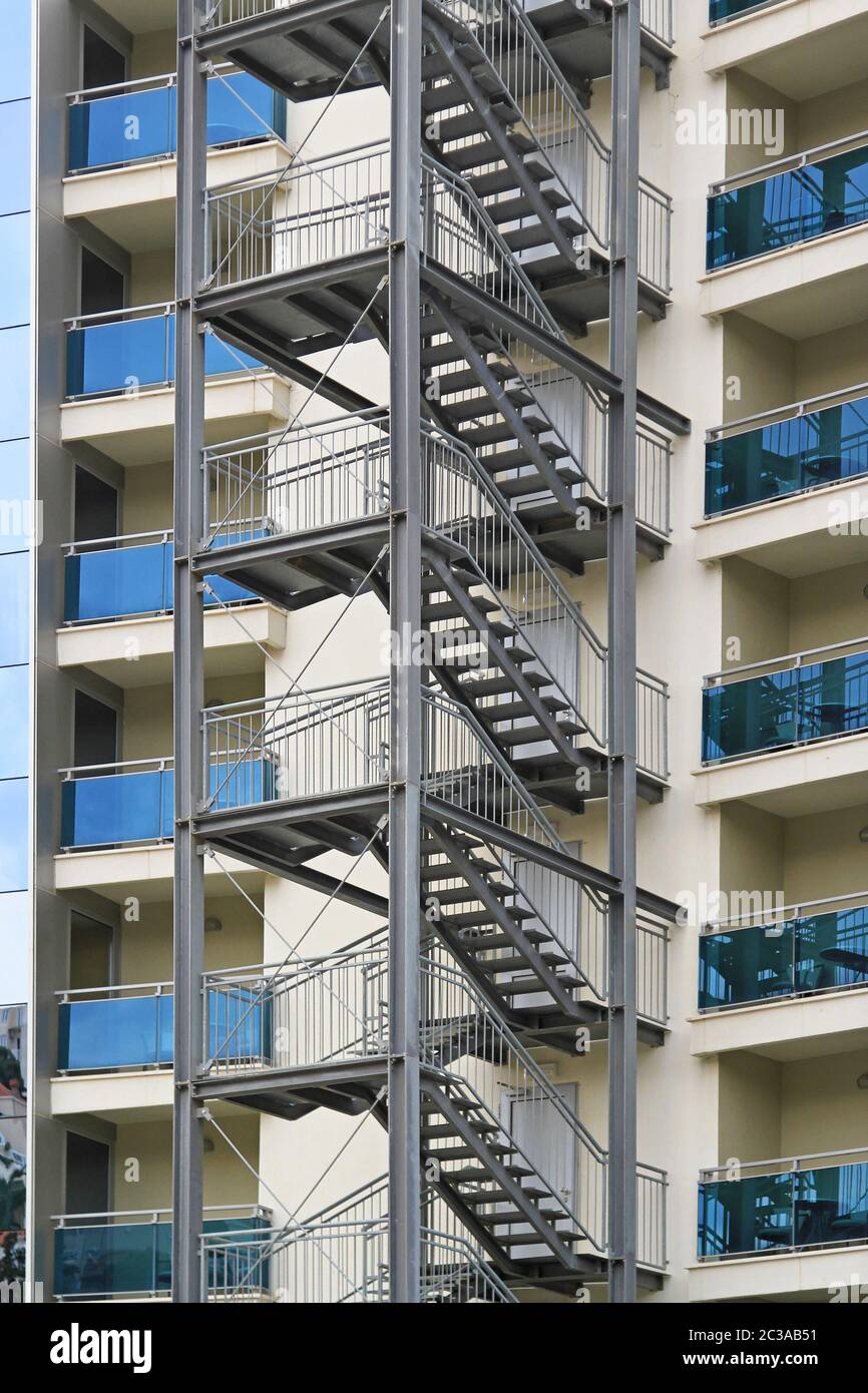 Building exterior fire escape stairs for emergency Stock Photo - Alamy