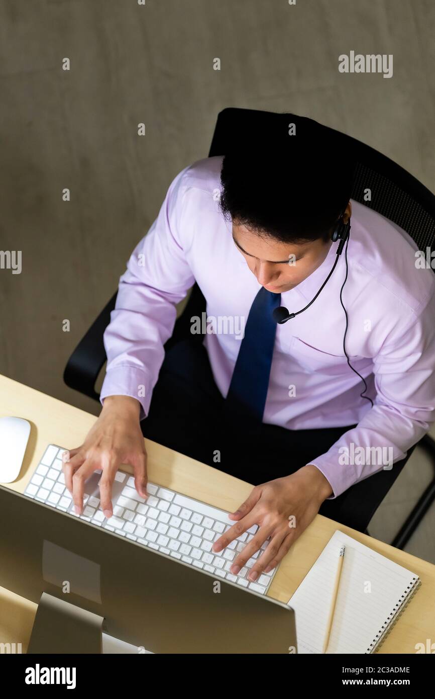 Call center working top view night Stock Photo - Alamy