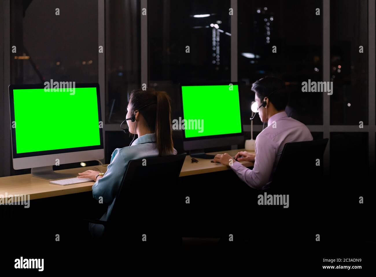 Call centre working at night Stock Photo - Alamy