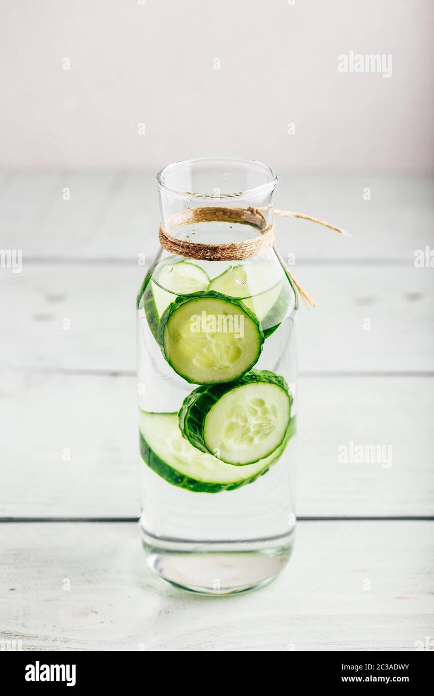 Infusion with sliced cucumber in glass bottle Stock Photo - Alamy