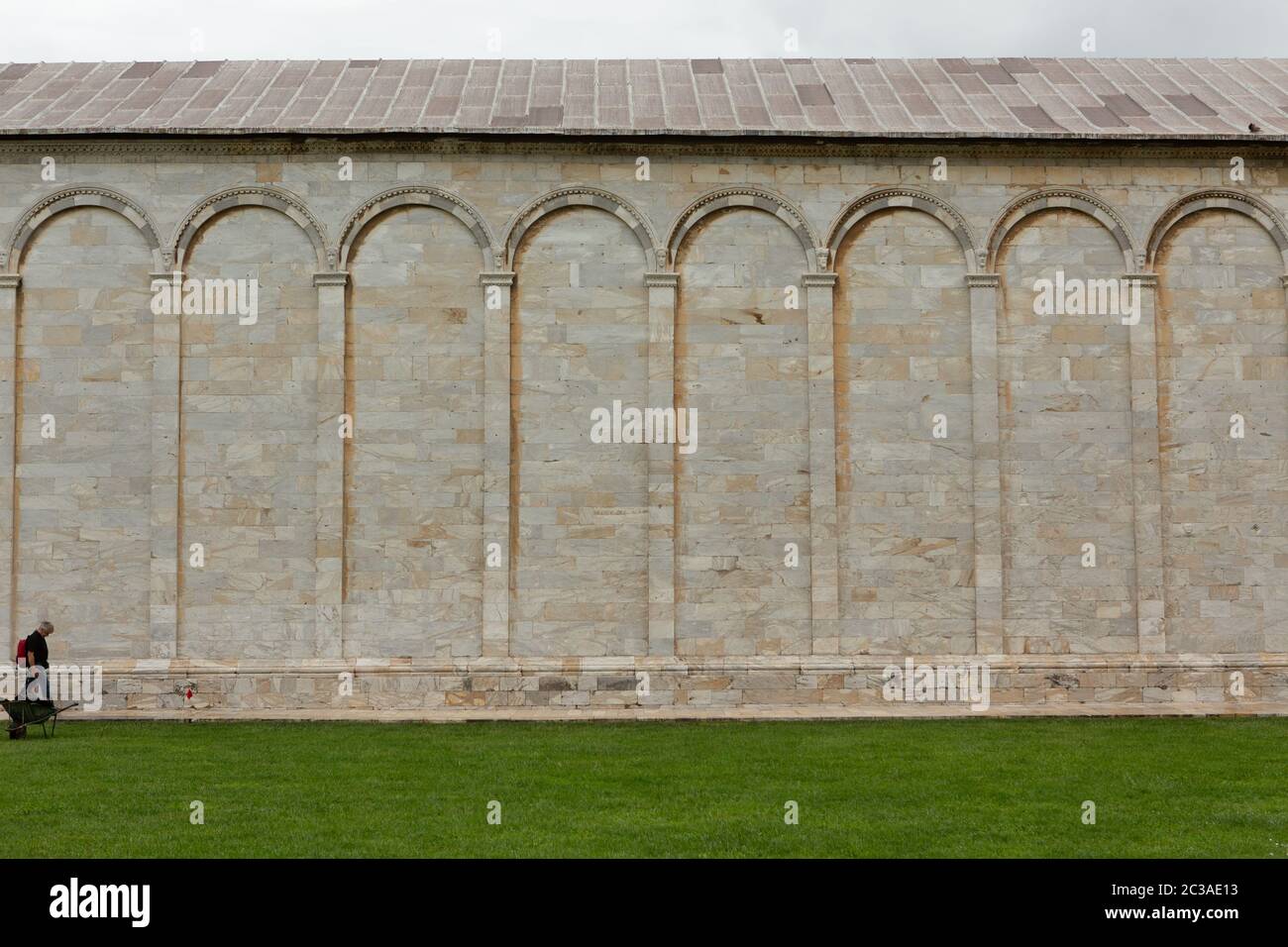 Ancient brick stone wall of religious historical building with columns ...