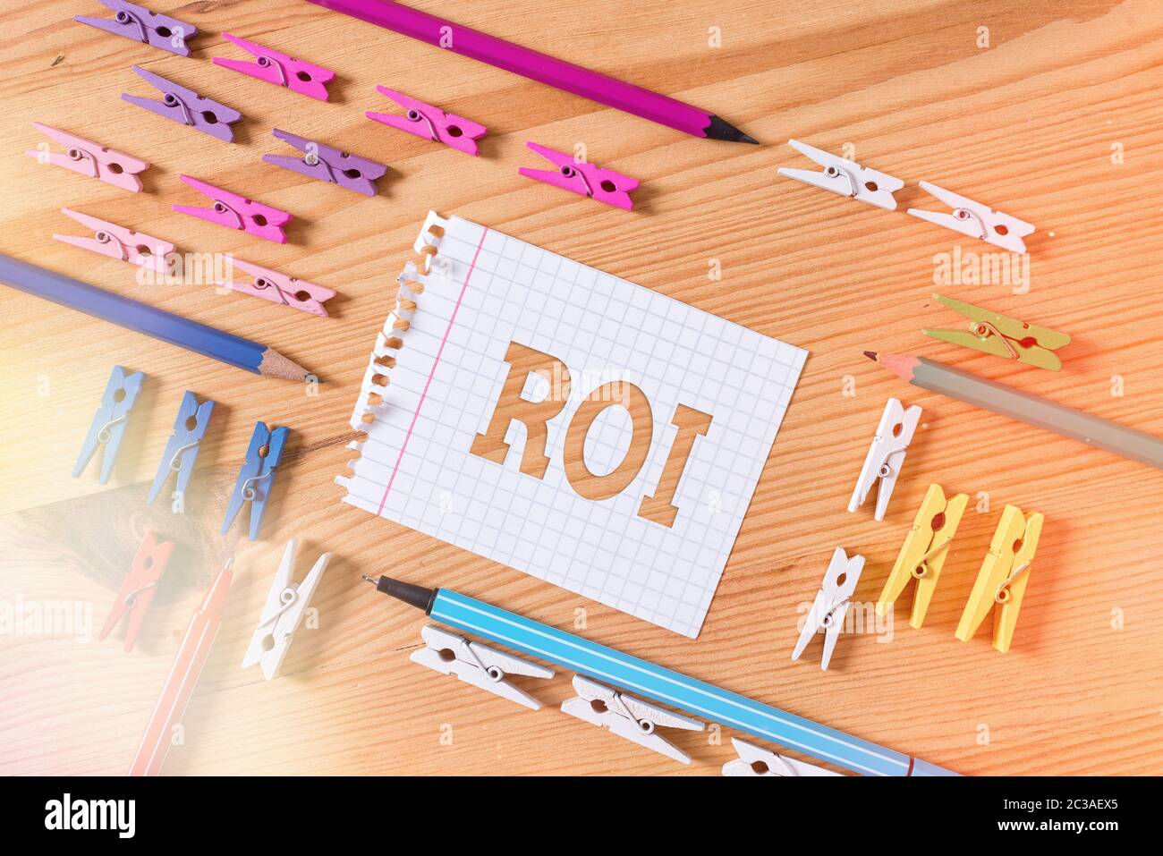 Writing note showing Roi. Business concept for performance measure used ...