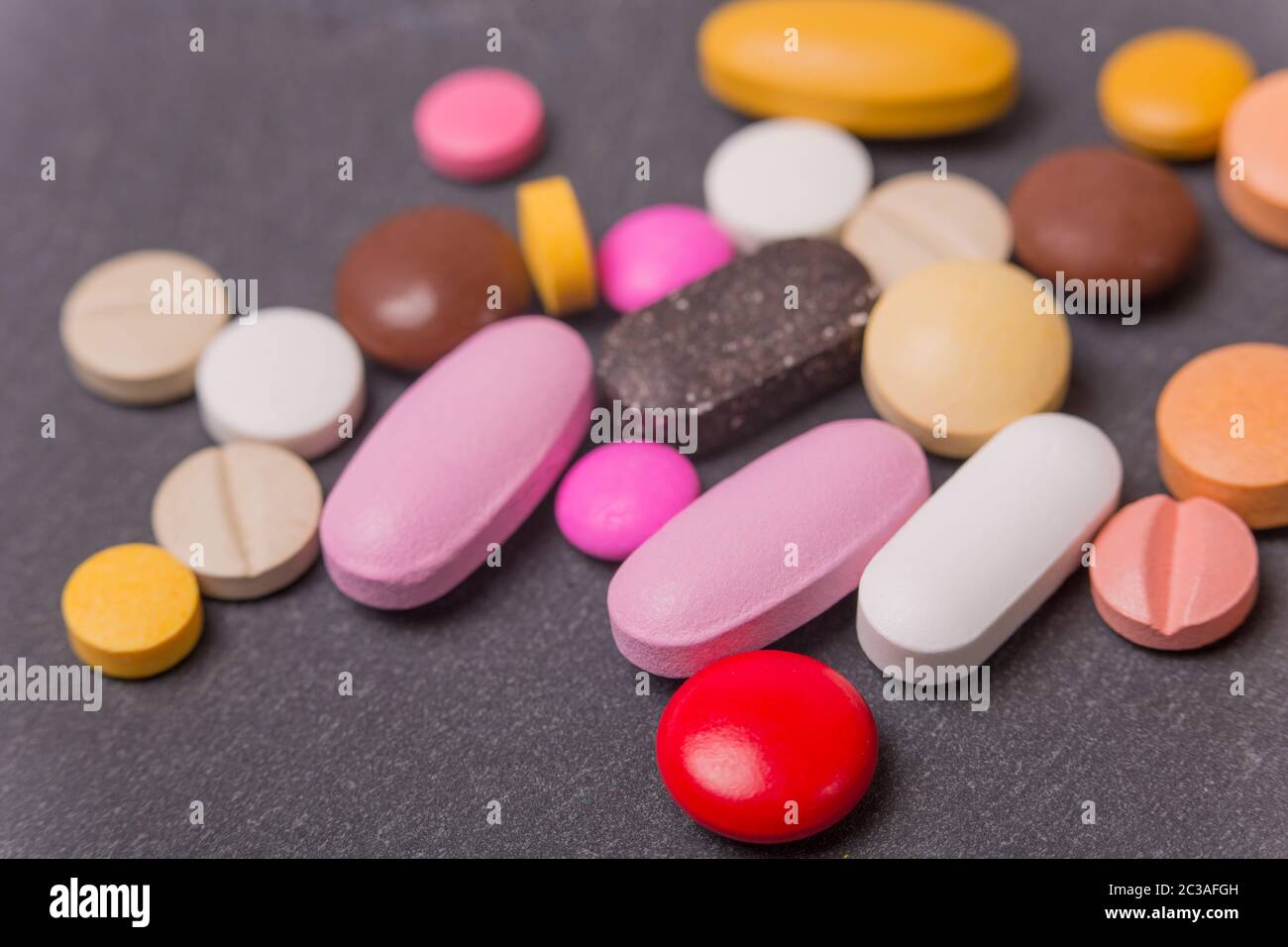 different Tablets pills capsule heap mix therapy drugs Stock Photo - Alamy
