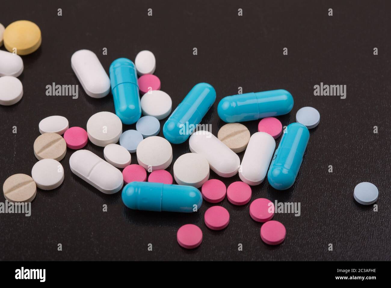 different tablets pills capsule heap mix therapy drugs Stock Photo - Alamy