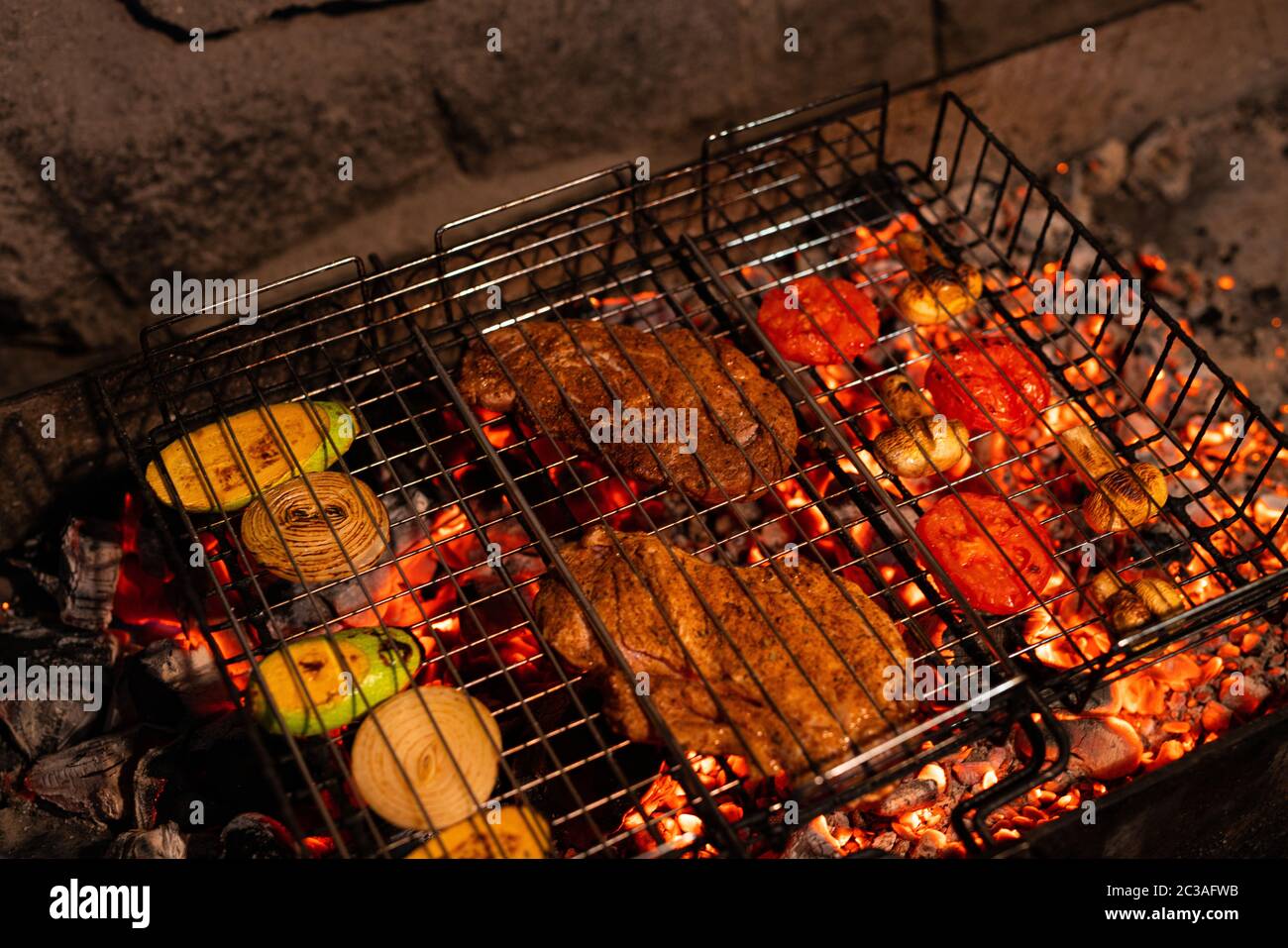 Spicy ingredients for barbecue in grill grate Stock Photo - Alamy