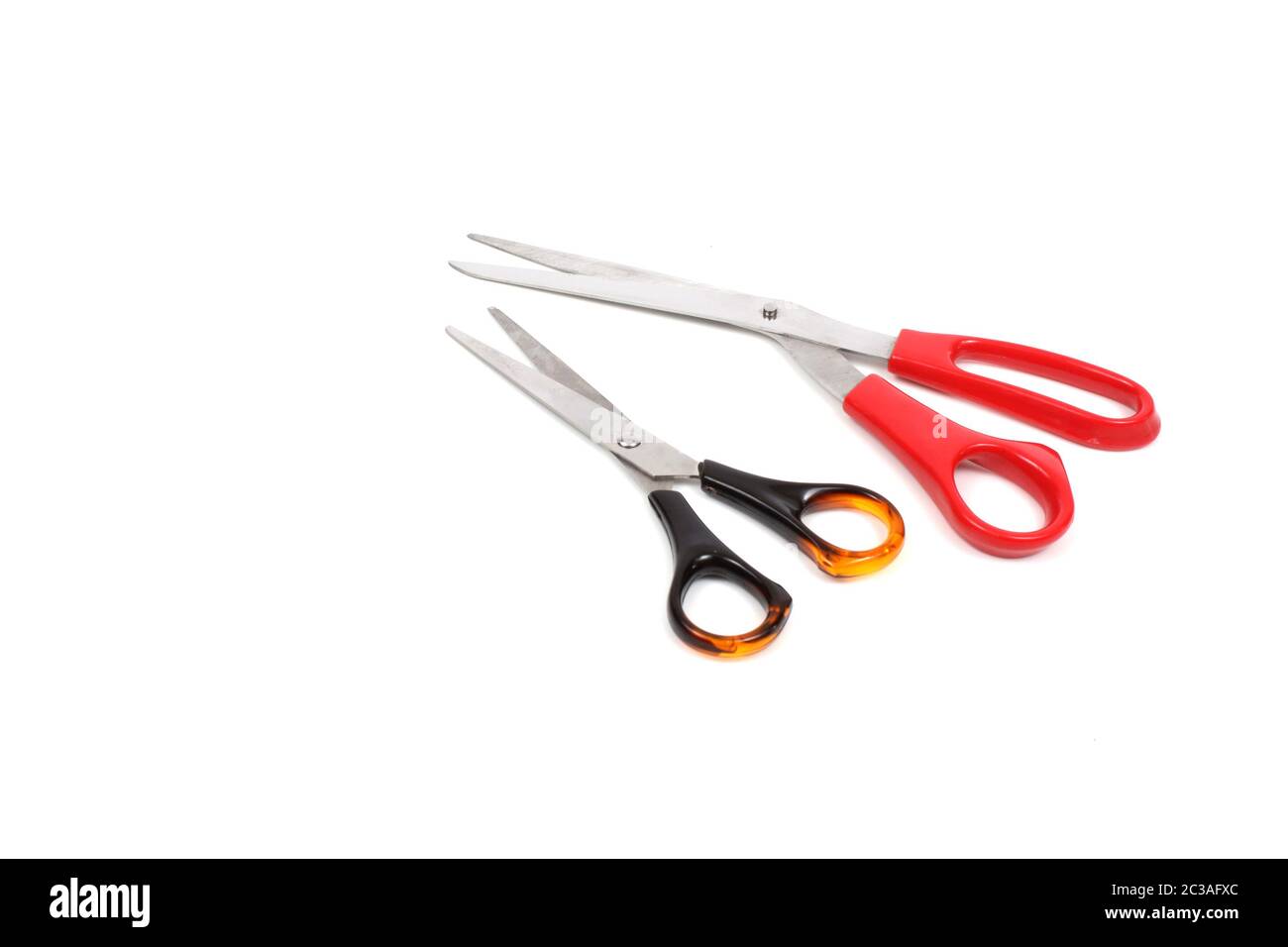 Two scissors hi-res stock photography and images - Alamy