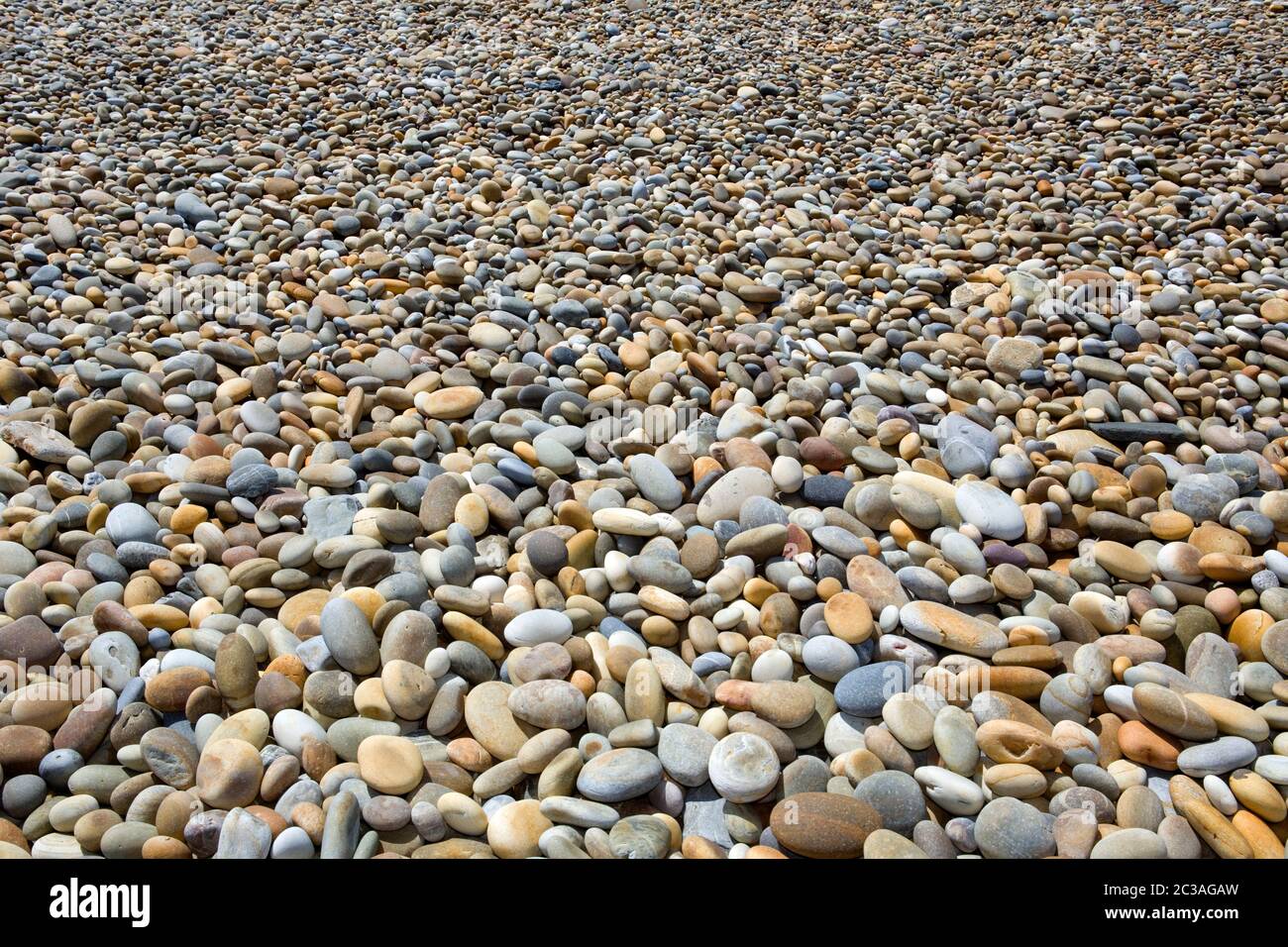 colorful pebble stone background, at the beach Stock Photo - Alamy