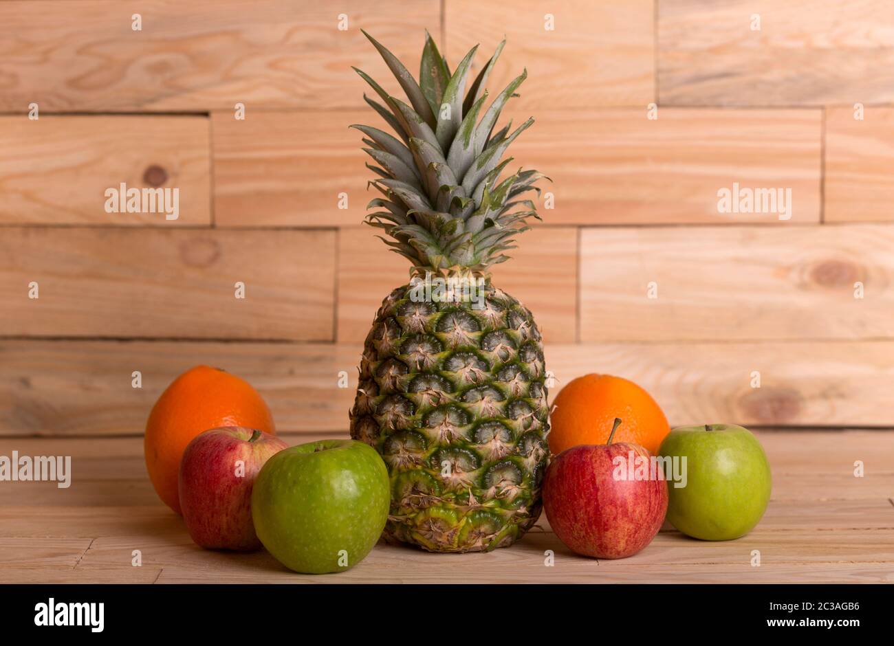 variety of fruits on a wooden table, studio picture Stock Photo - Alamy