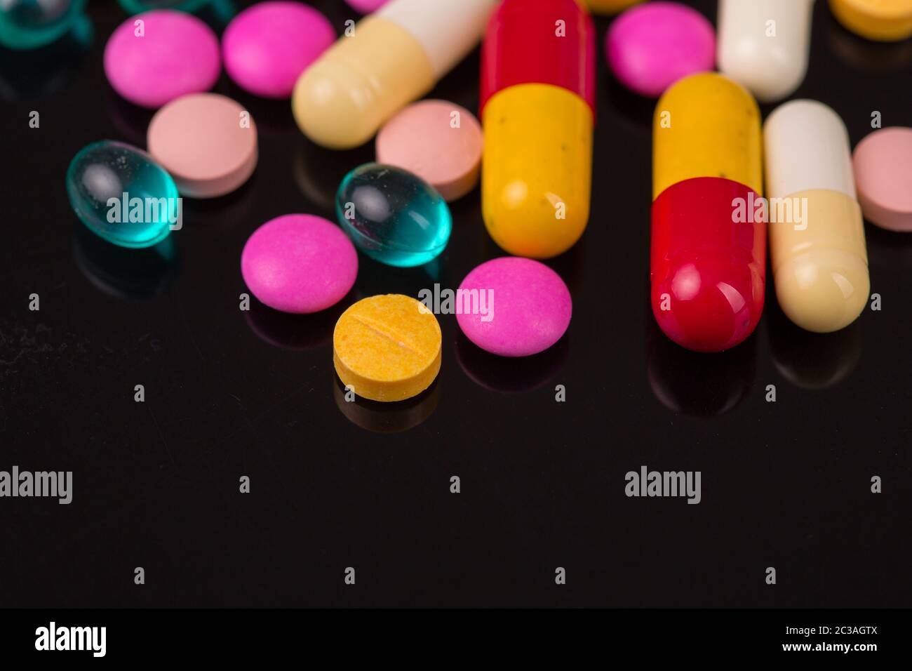 different tablets pills capsule heap mix therapy drugs Stock Photo - Alamy